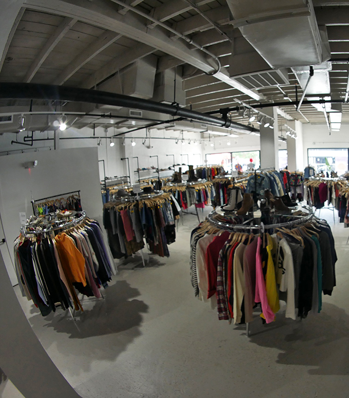 Fashion democracy in action: endless racks organized by type and size rather than the chaotic jumble you might expect from secondhand shopping.