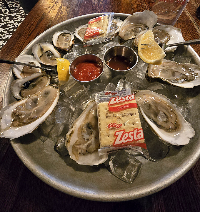 These oysters aren't just served—they're presented on a throne of ice, waiting for a squeeze of lemon and that perfect moment of briny bliss.