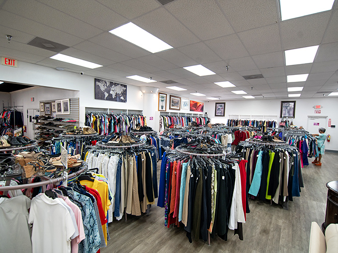 Color-coded clothing racks transform the usual thrift store scavenger hunt into a surprisingly civilized shopping experience.