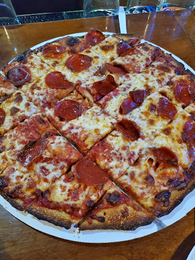 Pepperoni that curls into perfect little flavor cups, cheese that stretches for days. This isn't just pizza&mdash;it's edible architecture.