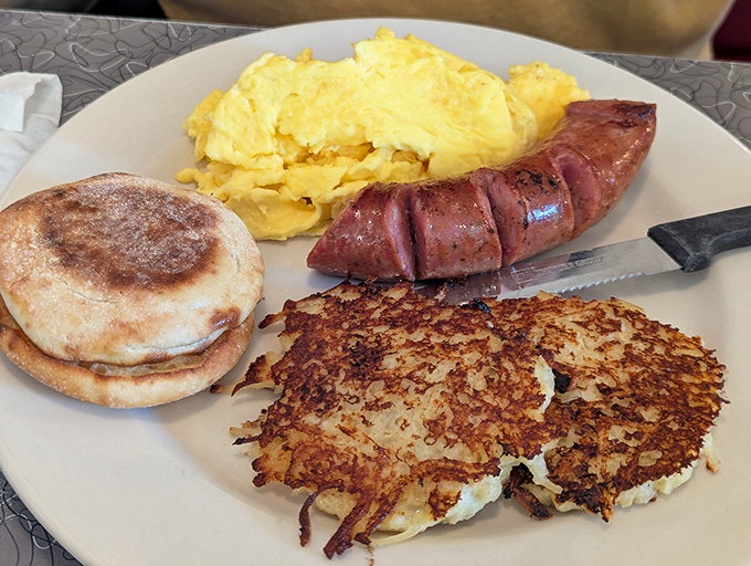 Golden potato pancakes meet fluffy scrambled eggs in a harmony that would make your grandmother weep with joy.