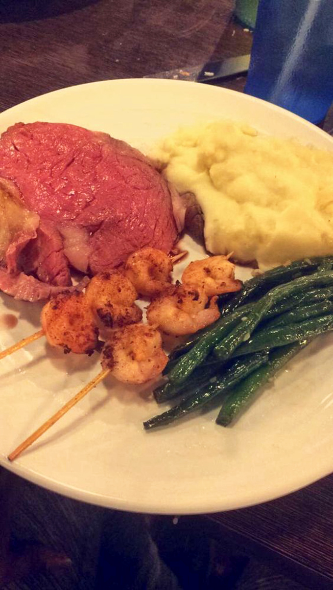 Prime rib that doesn't require a second mortgage, served alongside perfectly seasoned shrimp skewers. This plate screams "I'm treating myself" without saying a word.