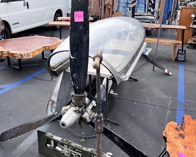 Yesterday's engineering becomes today's conversation piece&mdash;this vintage propeller and mechanical parts represent the industrial treasures waiting to be repurposed. 