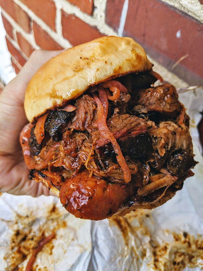Behold: the sandwich that launches a thousand road trips. This pulled pork doesn't just fall apart&mdash;it surrenders with dignity.