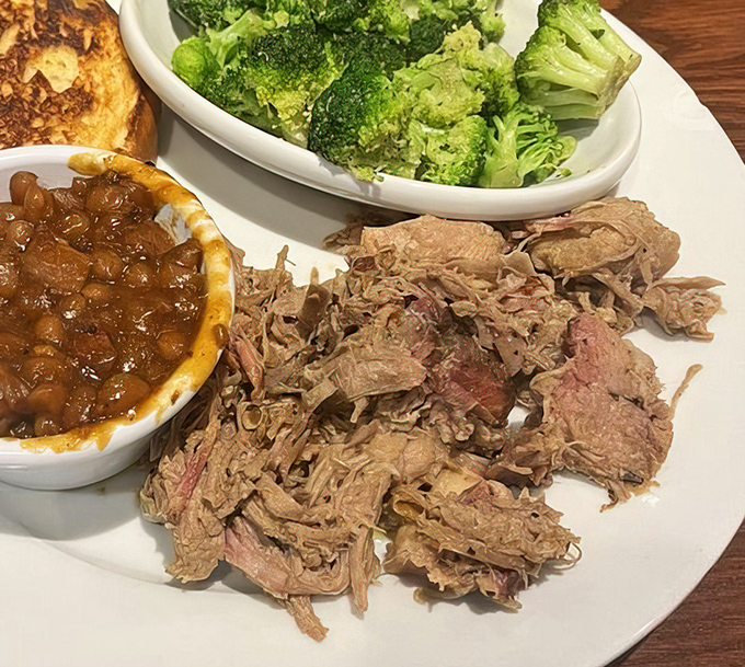 Pulled pork that doesn't need a filter or fancy introduction. This is meat that's had a proper slow-dance with smoke and time.