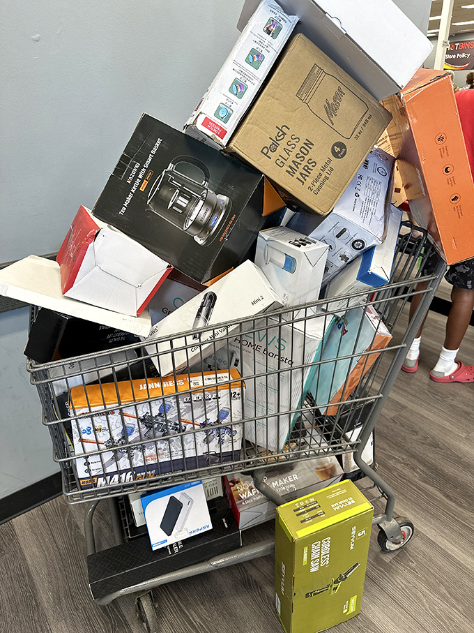 Jackpot! This overflowing cart represents the American Dream in shopping form. Someone's about to furnish half their home for what most people spend on a fancy dinner.