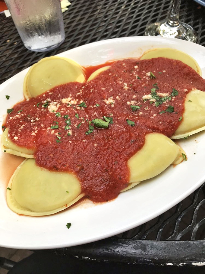 Behold the ravioli that will ruin you for all other pasta &ndash; pillowy perfection swimming in marinara magic.