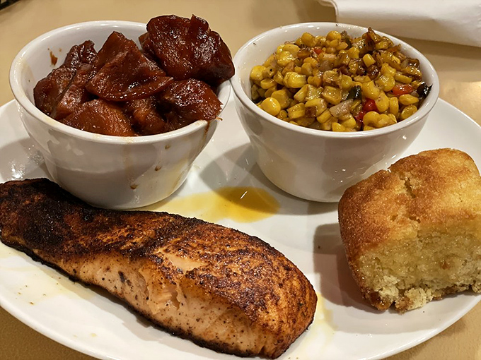 Blackened salmon that would make even pescatarians do a happy dance, paired with cornbread that refuses to play second fiddle.