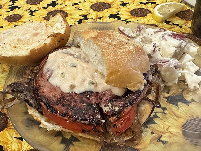 The mythical Schmitter&reg; in its natural habitat. This glorious stack of beef, cheese, fried onions, and special sauce is Philadelphia's answer to sandwich nirvana.