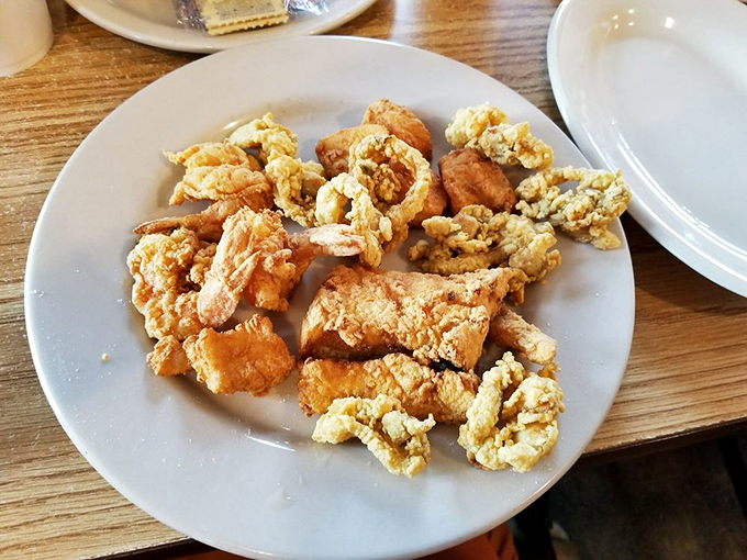 Golden-fried seafood that doesn't hide behind fancy plating &ndash; just honest-to-goodness crunch giving way to tender treasures from the deep.