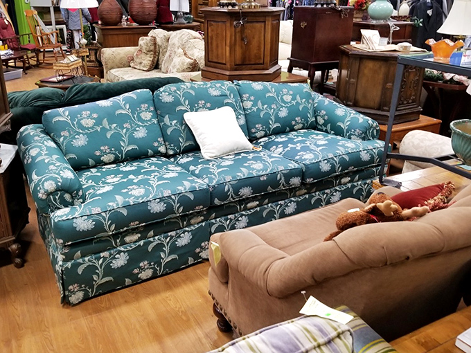 That teal floral sofa isn't just furniture&mdash;it's a time machine to a more elegant era when people actually sat upright during "Dallas" episodes.