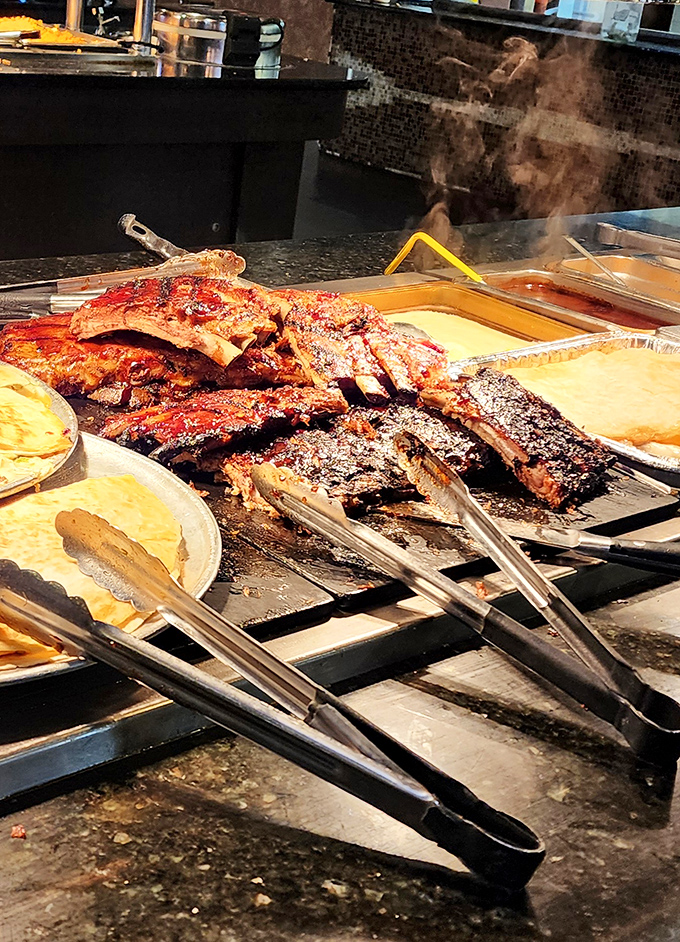 These glistening ribs aren't just cooked &ndash; they're transformed into sticky, caramelized perfection that would make any pitmaster nod in approval.