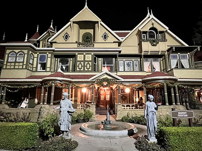 Classical statues and twinkling lights welcome visitors to the front entrance, setting a deceptively normal stage for the wonderfully weird experience that awaits inside.