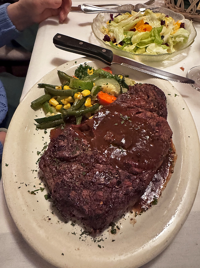 Behold the steak that launched a thousand road trips. That perfect char, that juicy center&mdash;this isn't dinner, it's performance art with beef as the star.