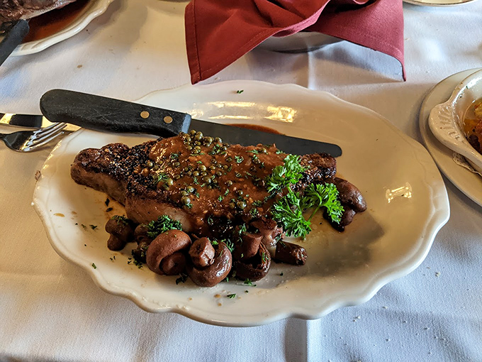 A perfectly seared steak with mushrooms that didn't just accompany the meat &ndash; they earned their place at the table through sheer deliciousness.
