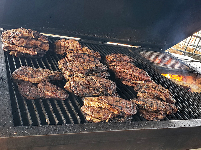 These beauties sizzling on the grill are why people drive hours through cornfields without complaining once.