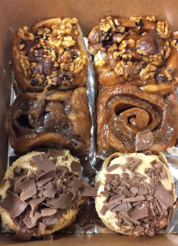 Behold the sticky bun motherlode! These glistening, walnut-studded beauties aren't just breakfast &ndash; they're an experience worth planning your day around.