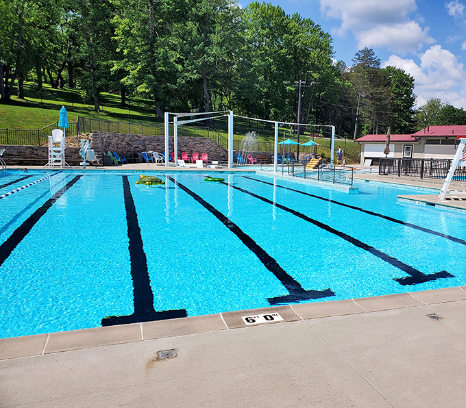 Nothing says "summer in small-town America" quite like the community pool, where lane lines and splashing kids create the soundtrack of July.