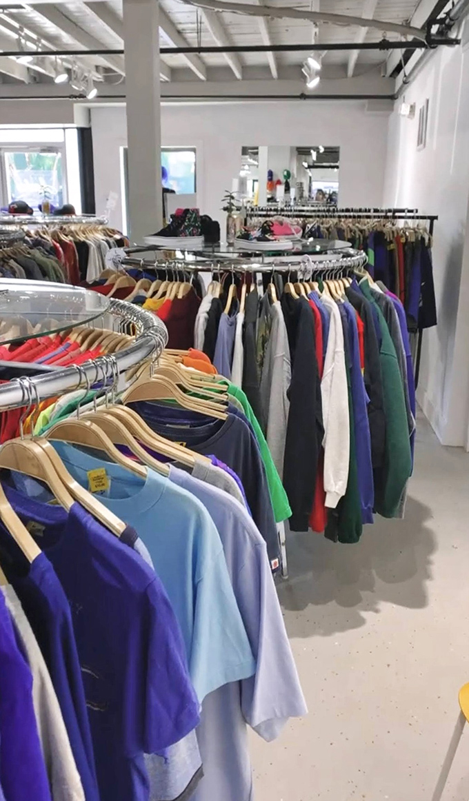 Vintage tees and cozy sweaters hang like old friends waiting for their next adventure.