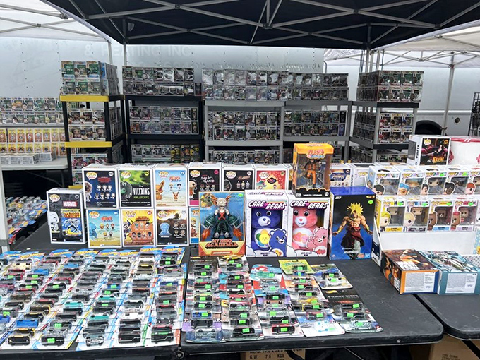 Pop culture heaven in plastic form! This collector's booth is where childhood nostalgia meets adult disposable income in a dangerous, wonderful dance.