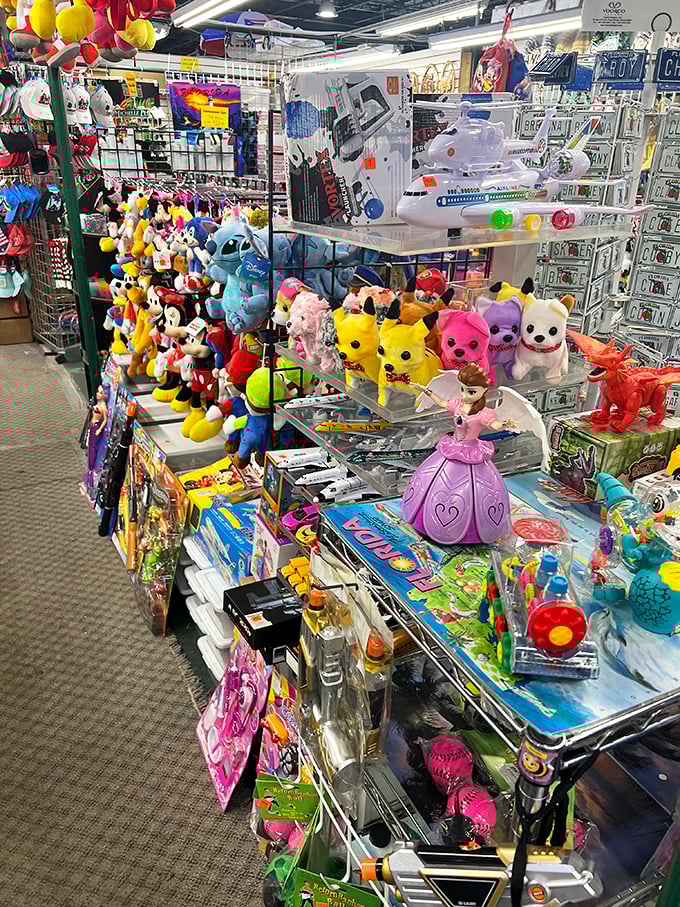 Childhood nostalgia by the armful! This toy booth is where Disney characters mingle with generic stuffed animals in a colorful plastic paradise