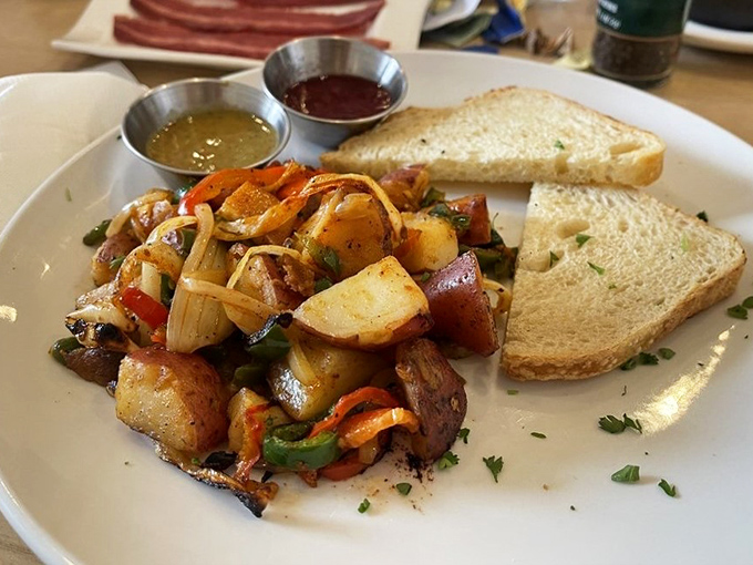 Breakfast potatoes that dance the fine line between crispy and tender, with toast that's achieved golden perfection. The supporting cast to that star turkey bacon.