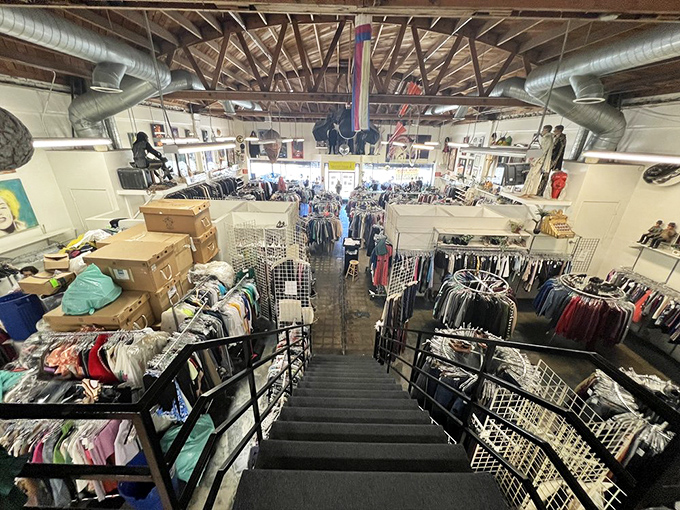 From this vantage point, you can almost hear the whispers of famous scripts emanating from thousands of garments that once graced television and movie sets.