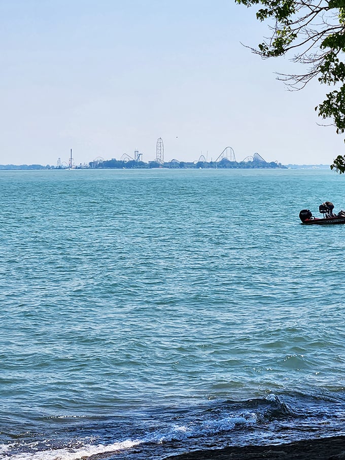 Lake Erie stretches endlessly here, with Cedar Point's roller coasters playing peek-a-boo on the horizon.
