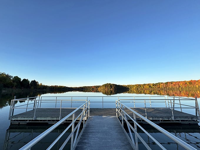 The fishing platform beckons with a promise: stand here long enough and life's complications fade with each ripple on the water.