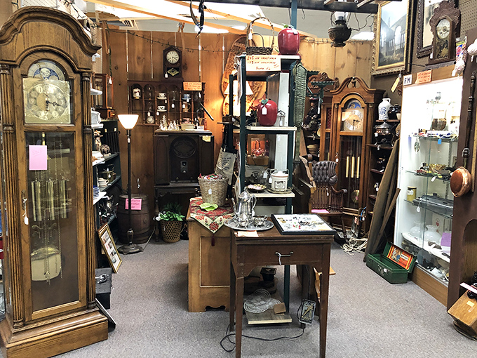 Grandfather clocks standing sentinel over wooden desks that have witnessed a century of conversations. Time literally stands still in this corner.