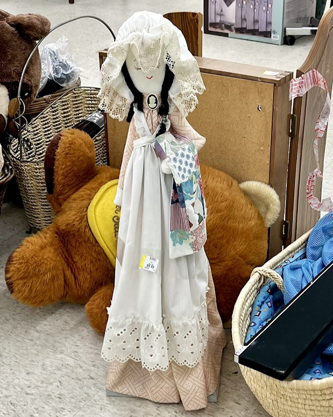 Handcrafted nostalgia waiting for a new home. This vintage-style doll might have stories to tell or simply become someone's cherished collectible.
