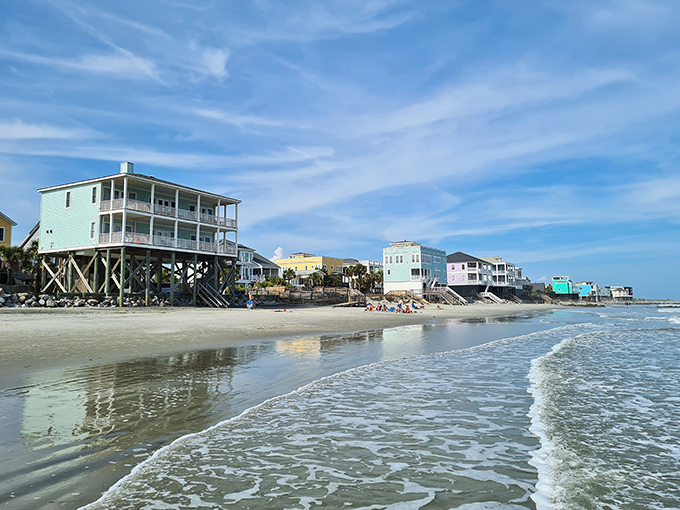 Where the waves meet pastel-colored beach homes. This isn't just waterfront property &ndash; it's where everyday life gets its own picture-perfect backdrop.