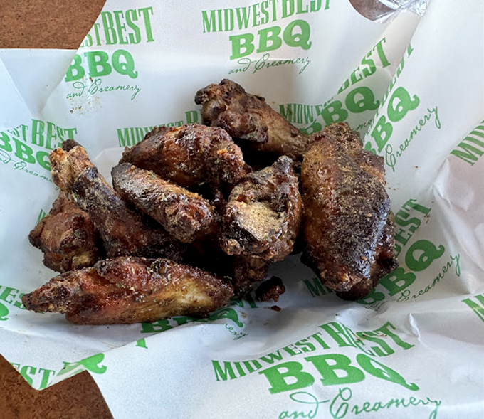 Smoke-kissed wings with a perfect dry rub that would make angels weep. These aren't just wings; they're the reason speed limits exist on the drive home.