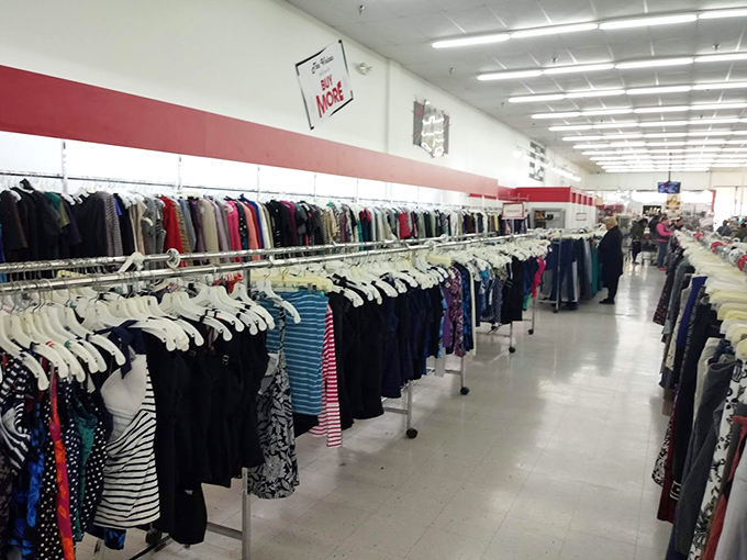Racks upon racks of potential wardrobe reinventions. Fashion's afterlife looks surprisingly organized under these fluorescent lights.