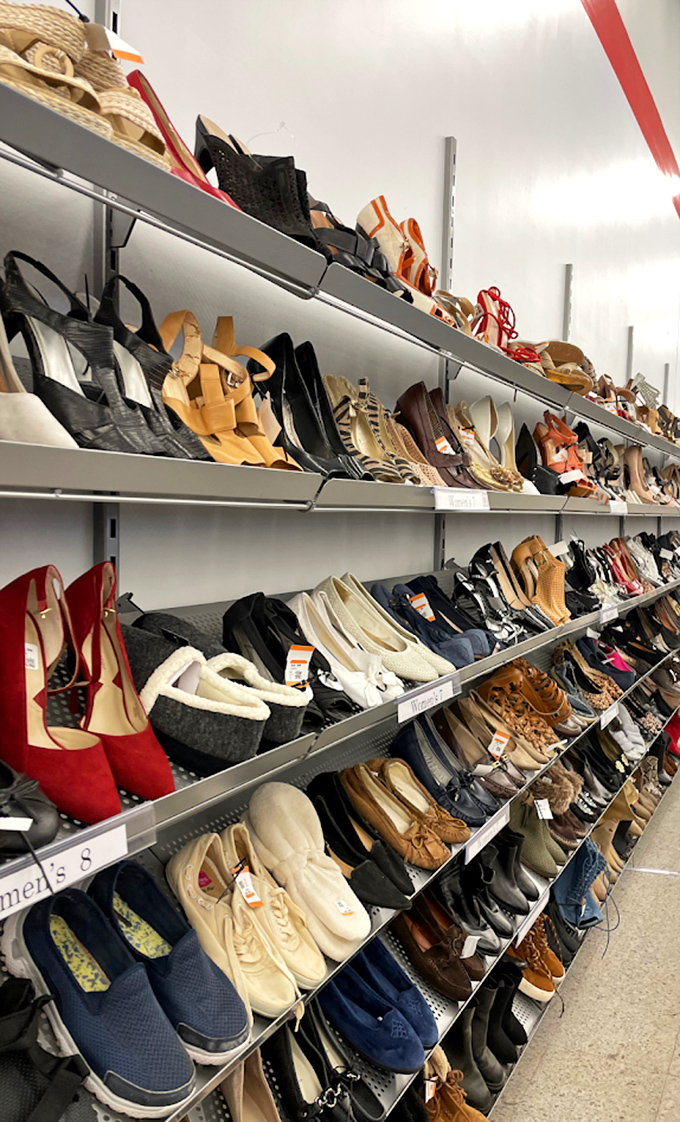 Shoe heaven exists, and it's organized by size! Those red pumps might have danced at a wedding before finding their way here.