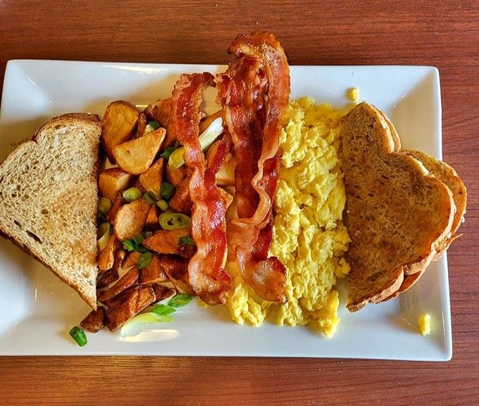 Breakfast perfection doesn't need fancy words &ndash; just eggs cooked exactly right, crispy bacon, and toast that's somehow better than the toast you make at home.