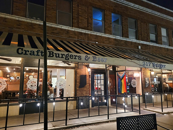 Behind that brick facade and striped awning lies a burger experience that elevates the humble patty to art form.