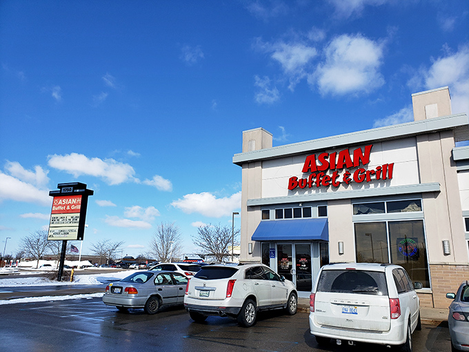 The bright blue awning and bold red sign are like a beacon for hungry shoppers seeking an Asian food adventure.