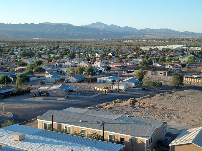 Bullhead City's residential neighborhoods spread across the desert landscape, with mountains standing guard in the distance.