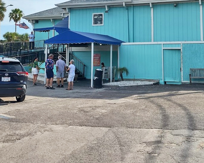 Crabby Bill's turquoise charm is the appetizer. The grouper sandwich is the main event you'll remember forever.