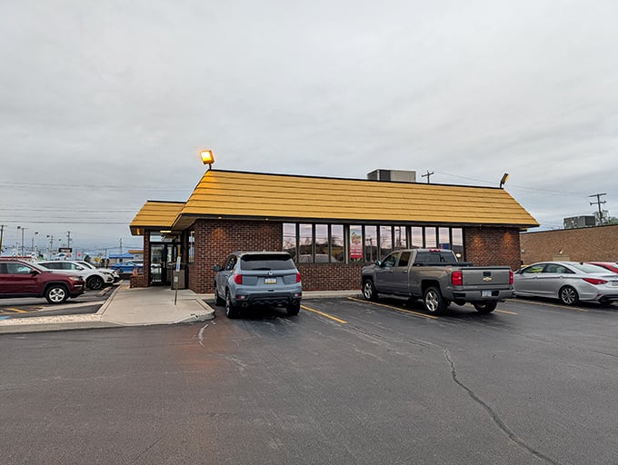 Famous Hot Weiner's yellow-topped building stands ready for duty. Your taste buds are about to experience a delicious deployment!