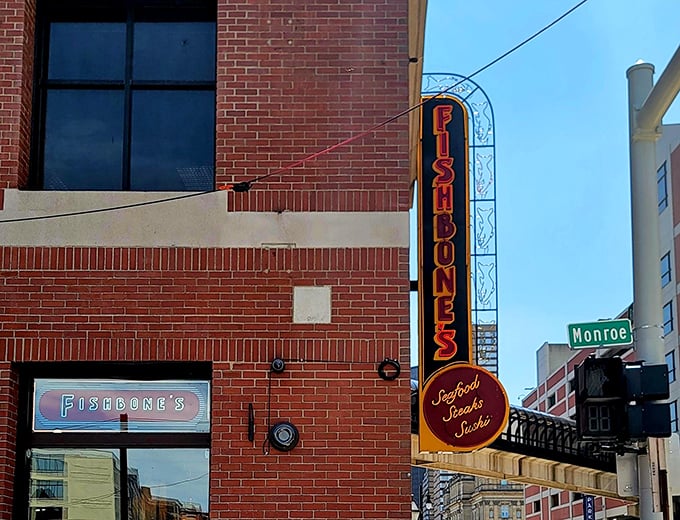 Fishbones brings a splash of neon to Greektown's historic brick buildings. Detroit's seafood scene shines brightest after dark.