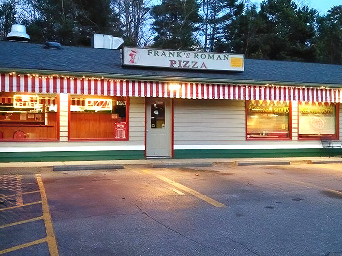 Classic red and white awning that's seen generations of pizza lovers come through those doors. Some traditions are worth preserving.