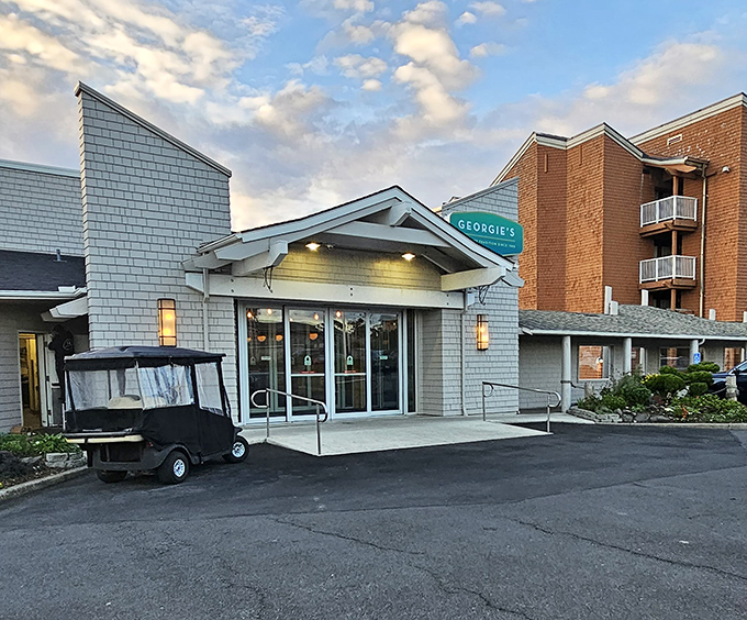 Georgie's knows the secret: big windows plus ocean views equals dining room gold, no interior decorator needed.