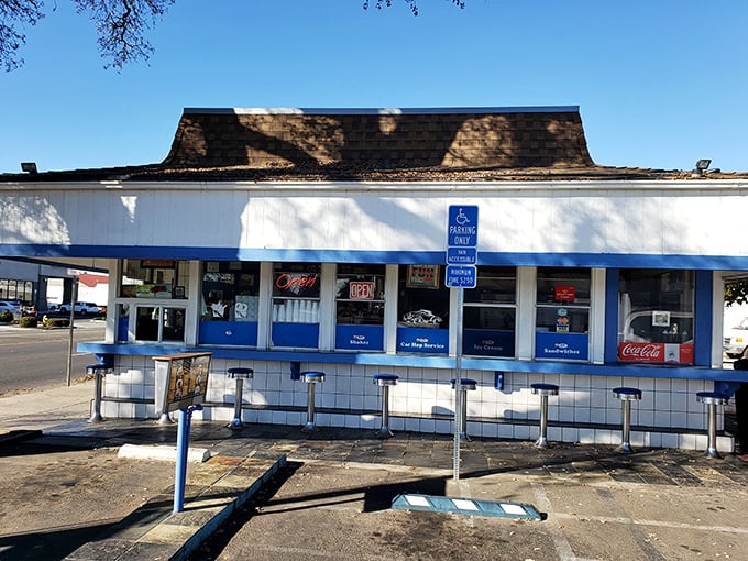 This blue-trimmed drive-in looks frozen in time. When burger joints were simple and milkshakes came in metal mixing cups.