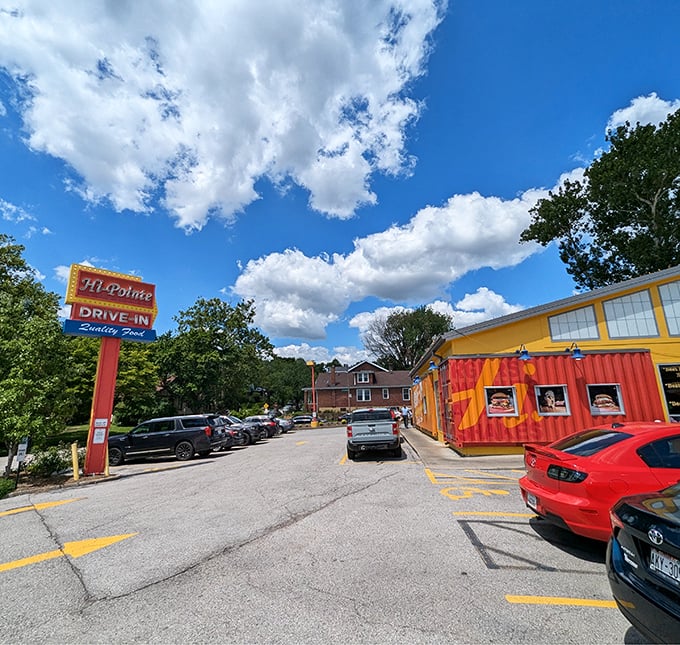 Hi-Pointe's sunshine-yellow building with fiery red accents practically shouts "good times ahead!" This modern drive-in reinvents burger classics with playful twists.