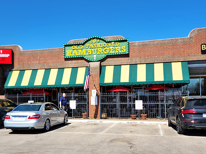 Those green and yellow awnings aren't just decoration &ndash; they're a signal flag for serious burger enthusiasts.