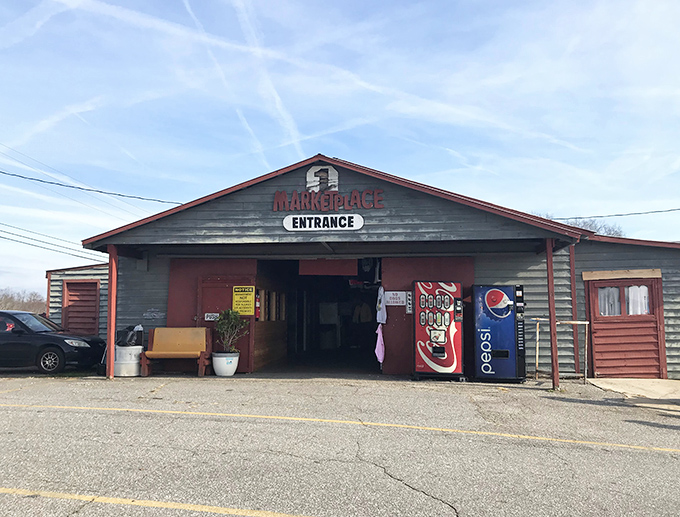 Jamestown's rustic entrance has that perfect "you've arrived somewhere special" vibe. The bench invites you to rest before treasure hunting begins!