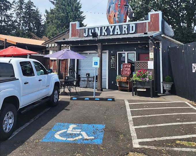 Rustic charm with a side of attitude! This corrugated metal facade and "Junkyard" sign promise food that's anything but ordinary or pretentious.