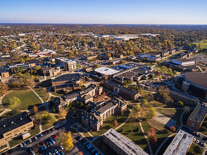 A sweeping aerial view reveals Marion’s inviting mix of neighborhoods, green spaces, and community landmarks glowing under clear Indiana skies.